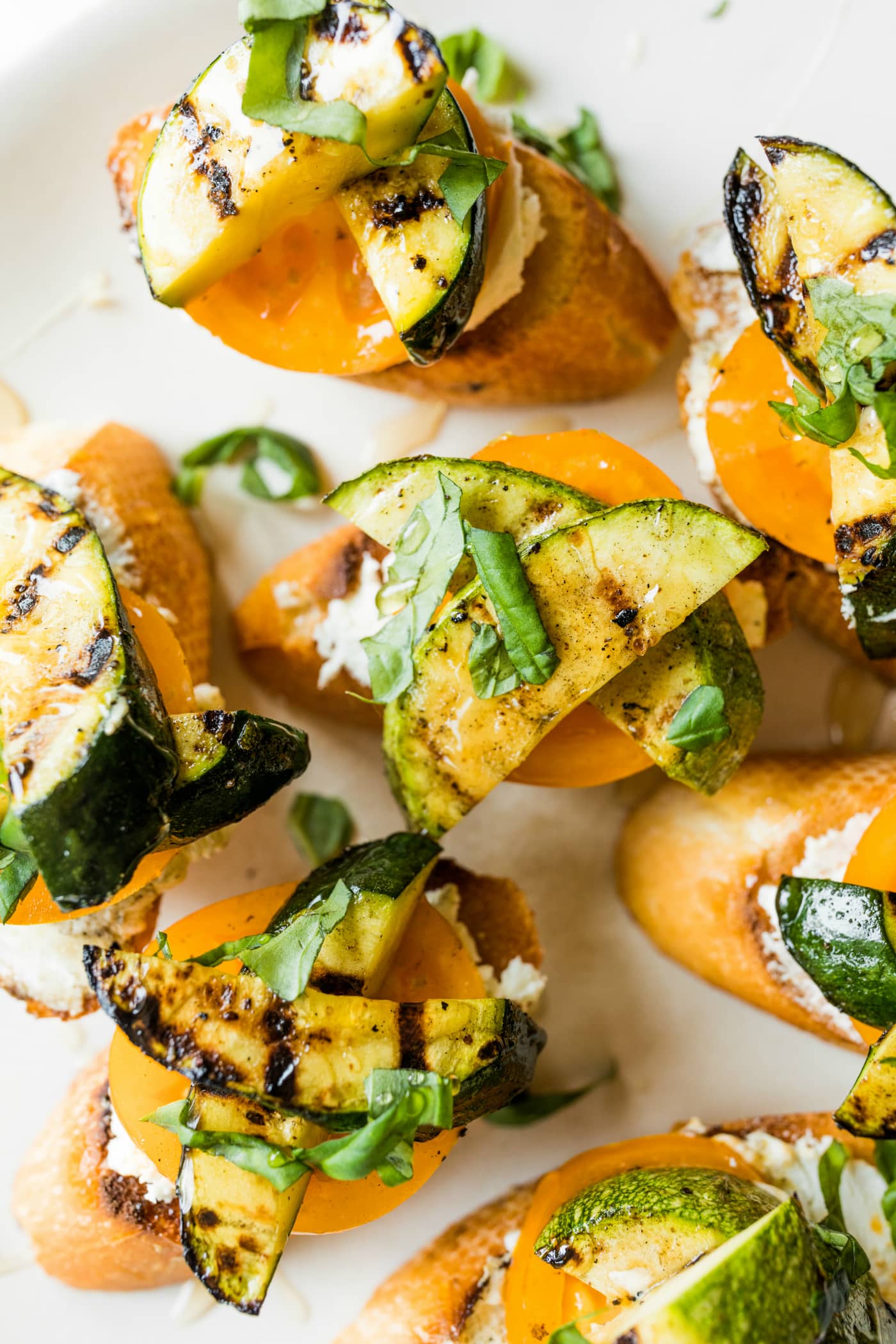 Grilled Zucchini Tomato Toasts - Reluctant Entertainer